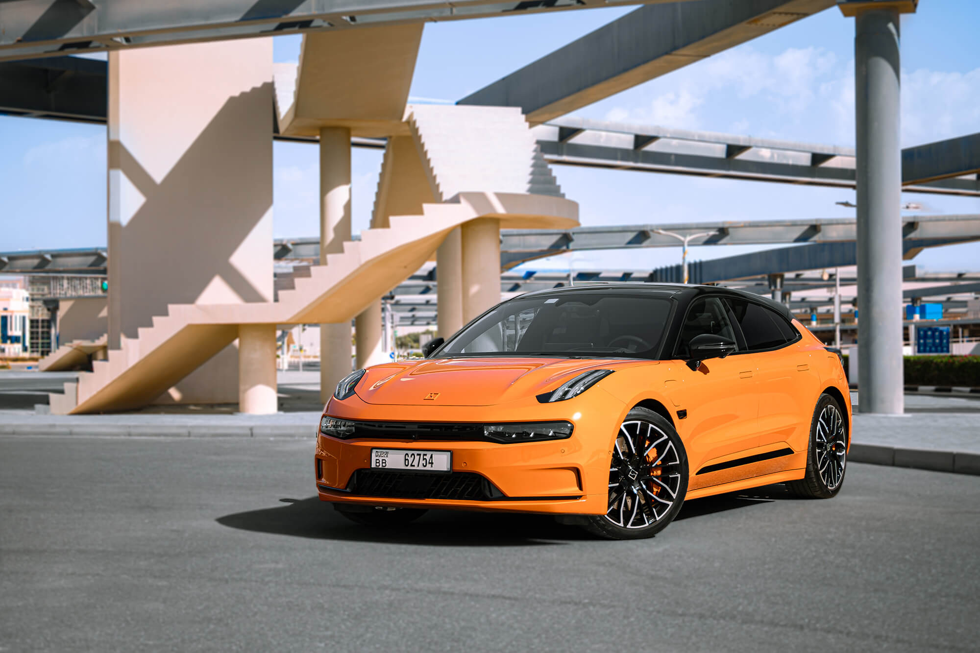 Rent Zeekr 001 Orange in Sharjah- Electric - Octane Car Rental