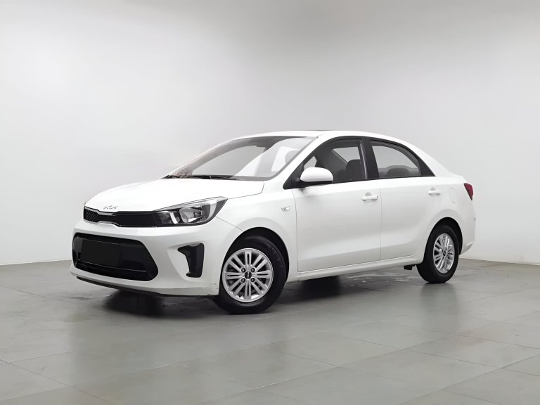 Rent Kia Pegas White in Sharjah- Sedan - Octane.Rent